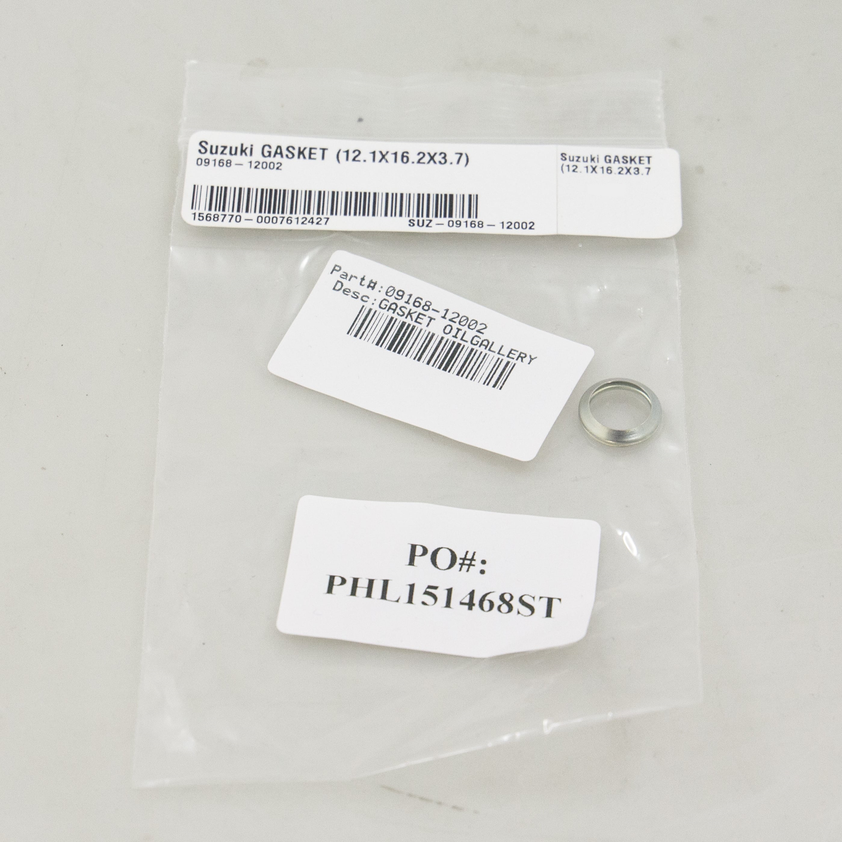 Suzuki 09168-12002 GASKET (12.1X16.2X3.7) - RevZilla
